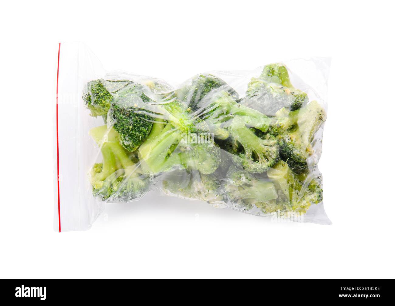 Frozen broccoli in plastic bag on white background Stock Photo - Alamy