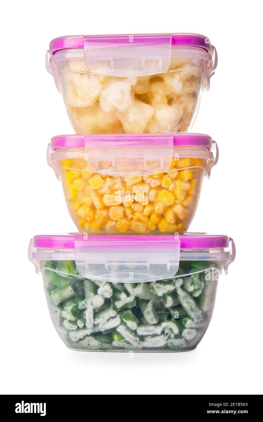 Frozen vegetables in plastic containers on white background Stock Photo ...