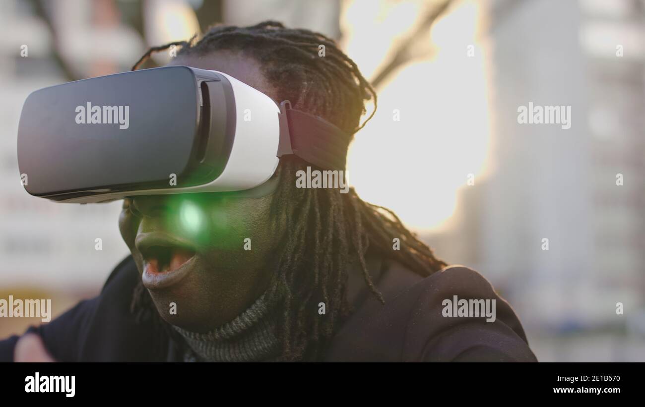 Black walking with headset hi-res stock photography and images - Alamy