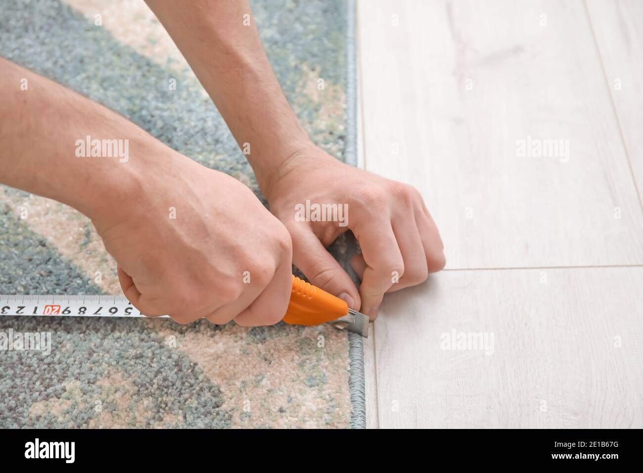 Cutting carpet tape hi-res stock photography and images - Alamy