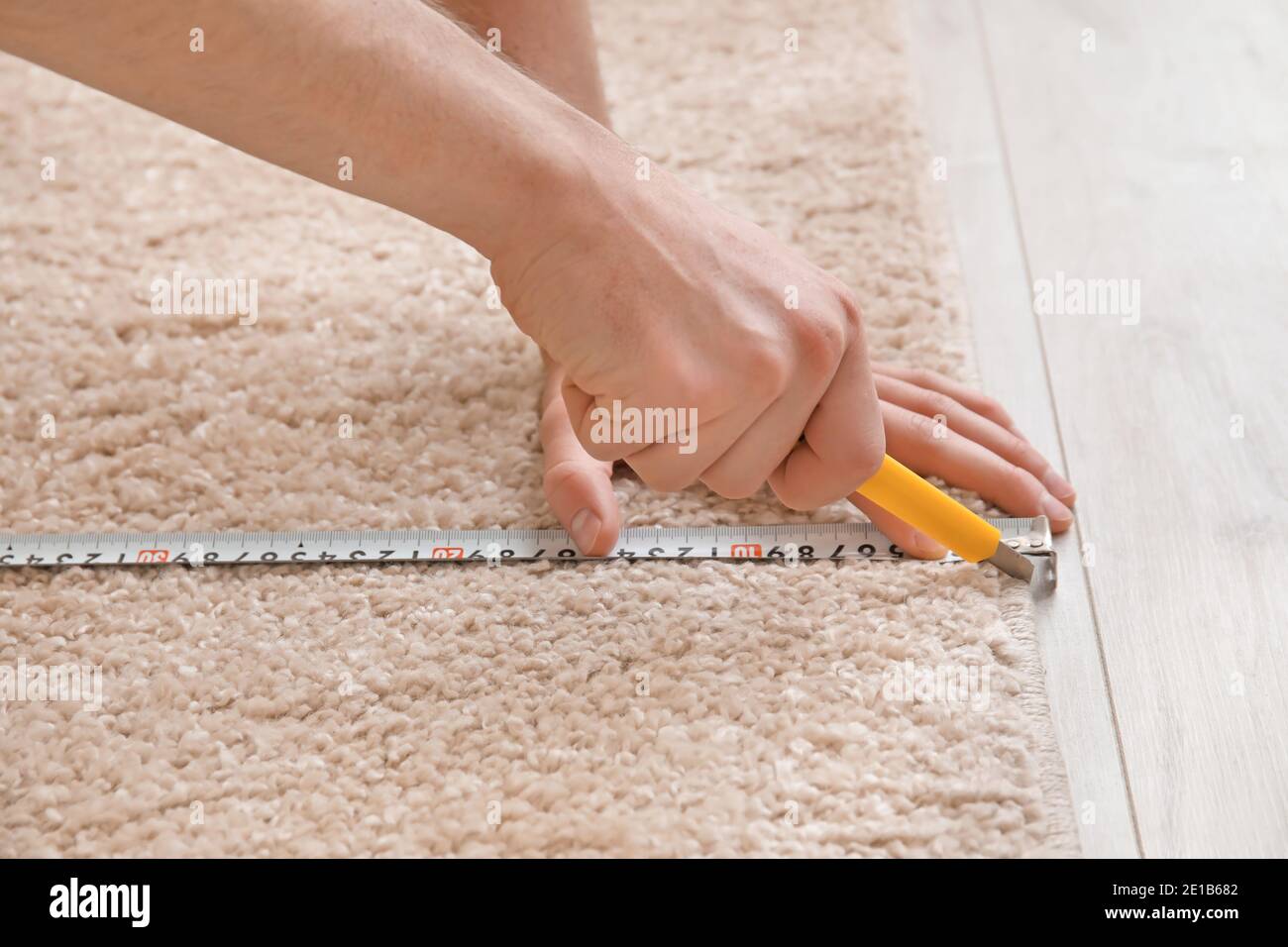 Floor man measuring room hi-res stock photography and images - Alamy