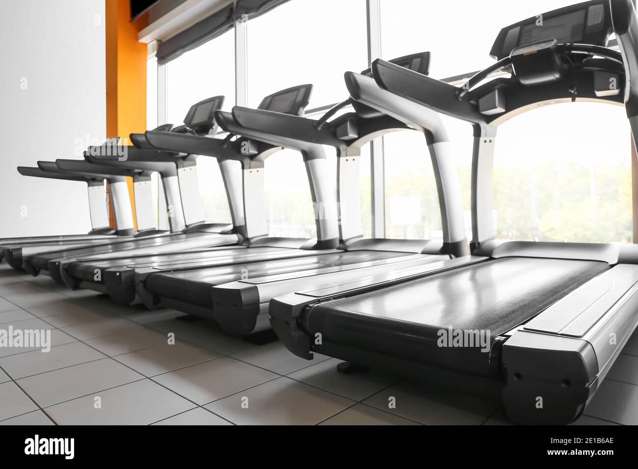 Interior of modern gym with treadmills Stock Photo - Alamy