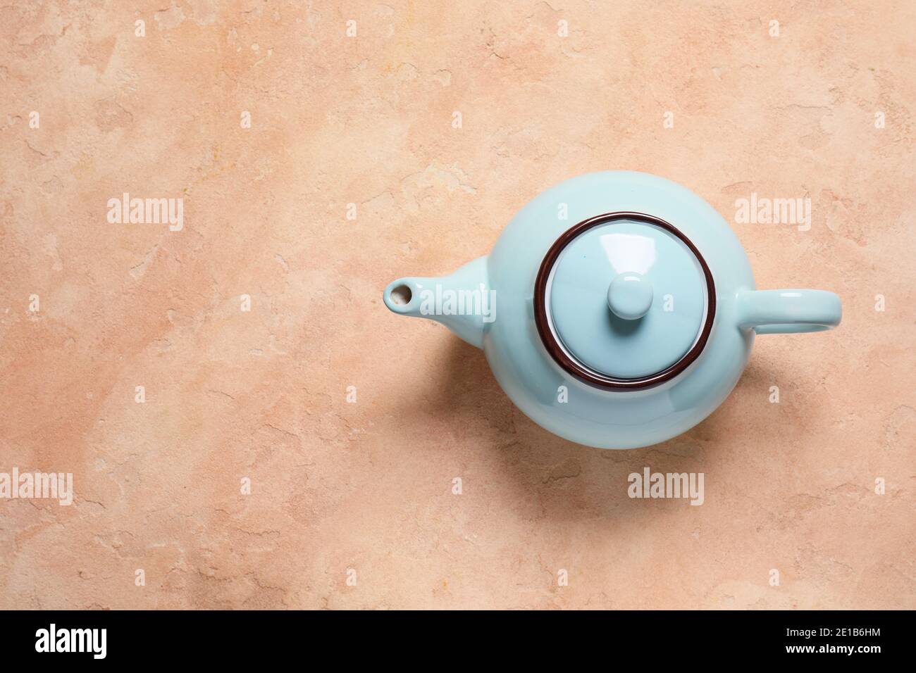 Teapot on table, top view Stock Photo - Alamy