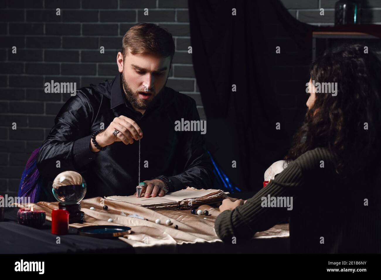 Clairvoyant telling client her future Stock Photo - Alamy