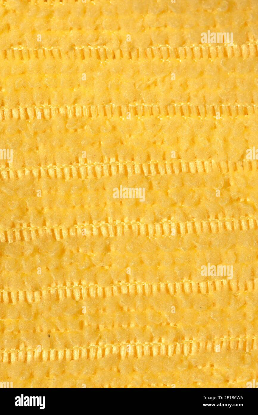 Fabric yellow striped background. Soft fiber texture polyester close-up ...