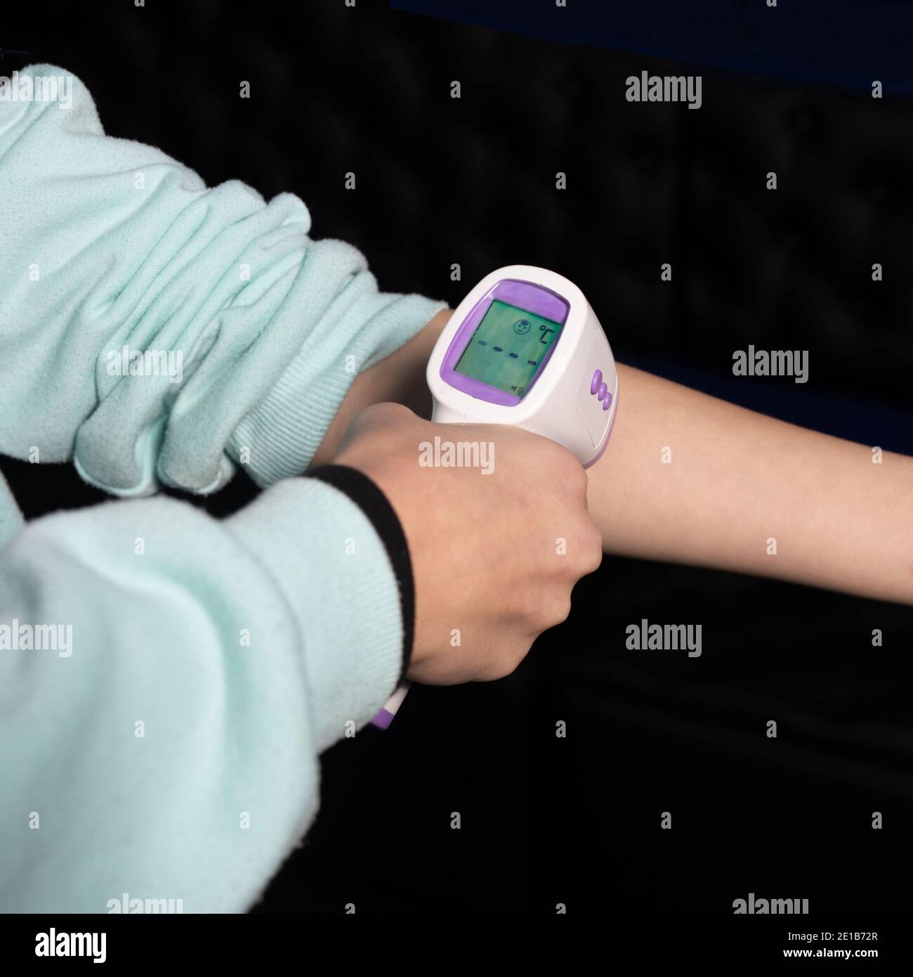 Measuring body temperature by infrared electronic digital thermometer ...