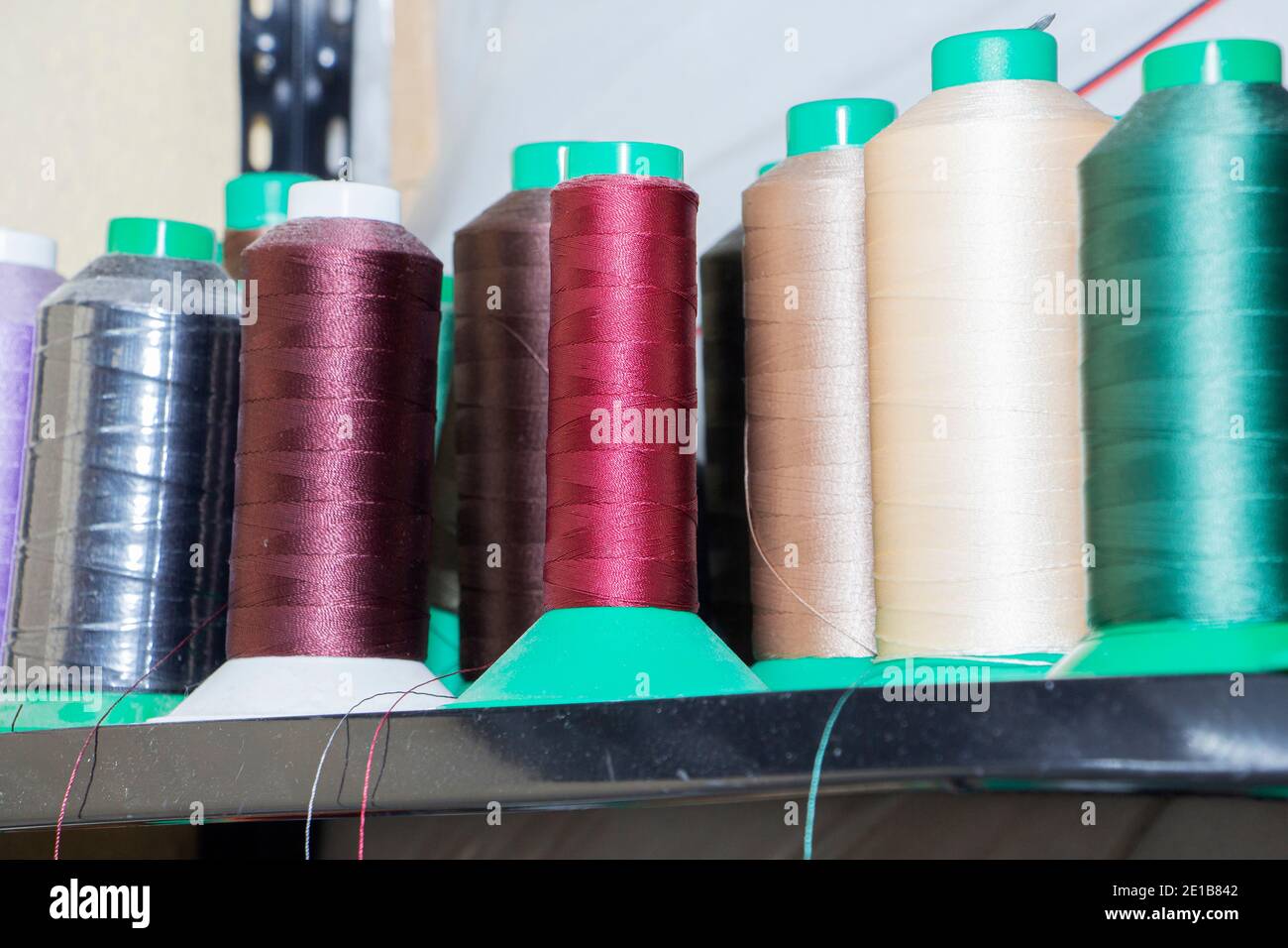 Colorful reels with threads, backgrounds, images related to the tailor ...