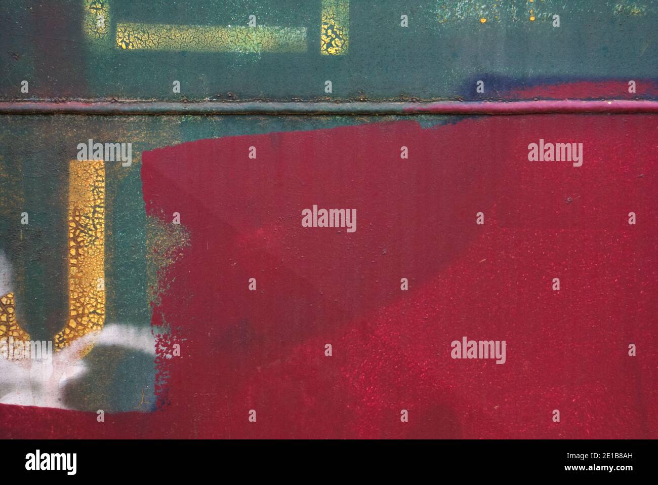 Abstract green red background texture with yellow typographic lettering ...