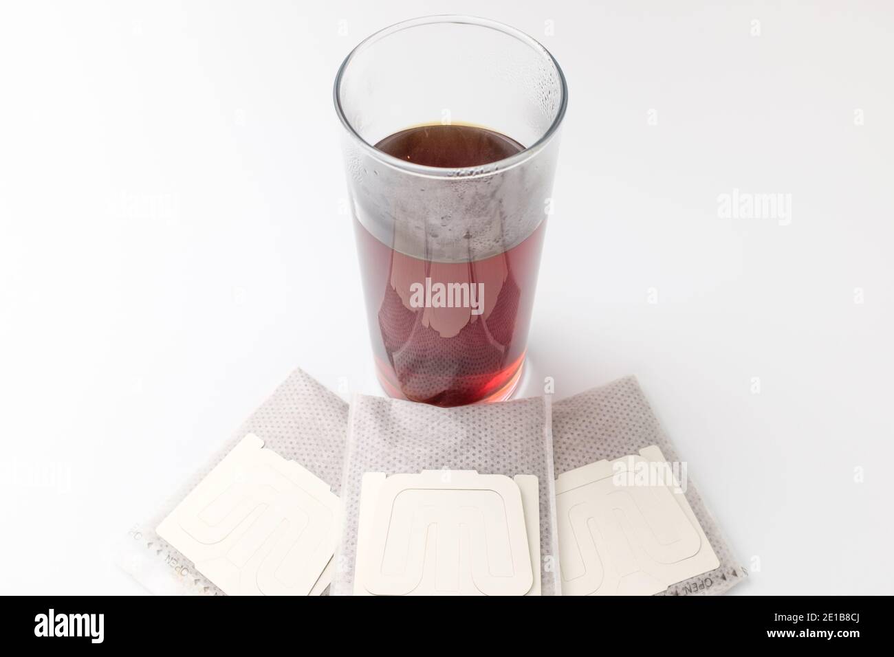 Drip bag coffee on white background Stock Photo - Alamy