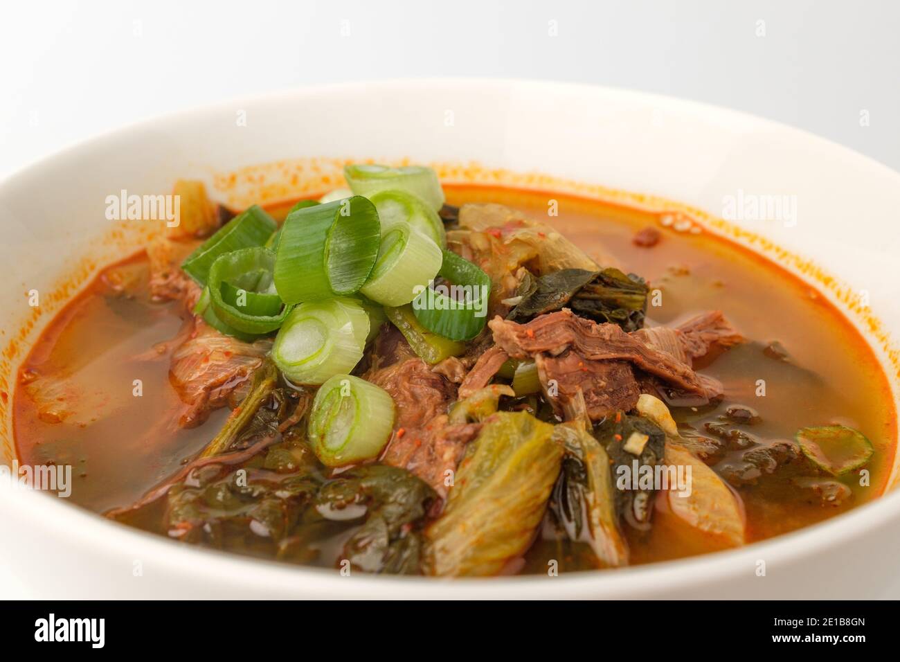 Beef soup on white background Stock Photo - Alamy