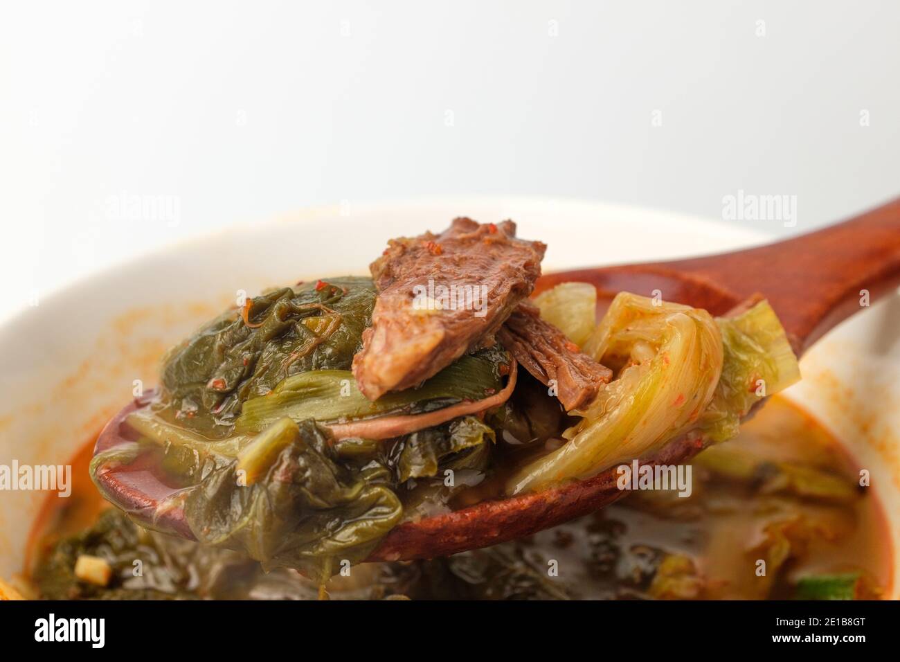 Beef soup on white background Stock Photo - Alamy