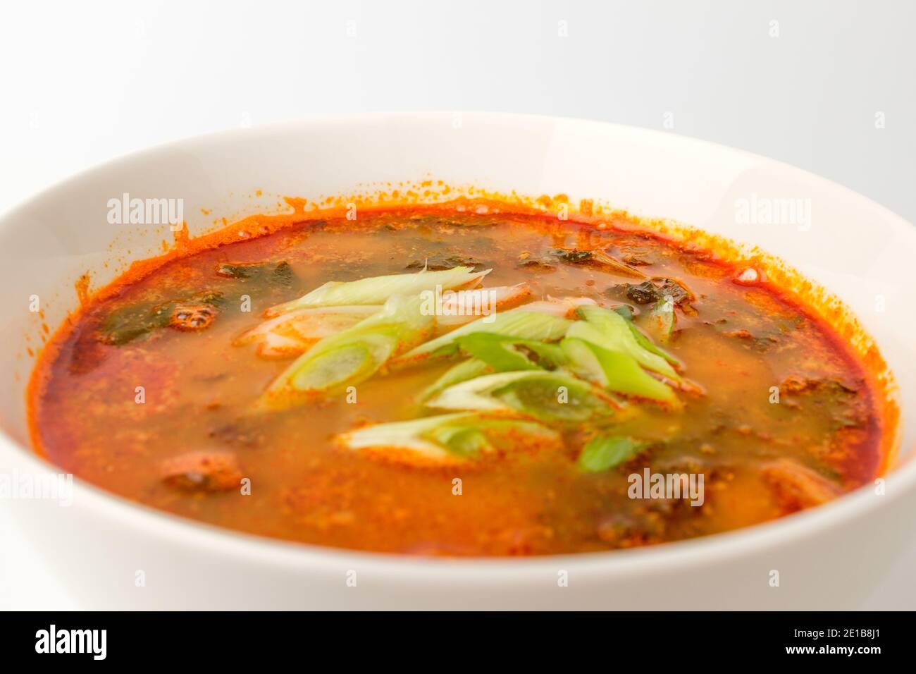 Eel soup on white background Stock Photo - Alamy