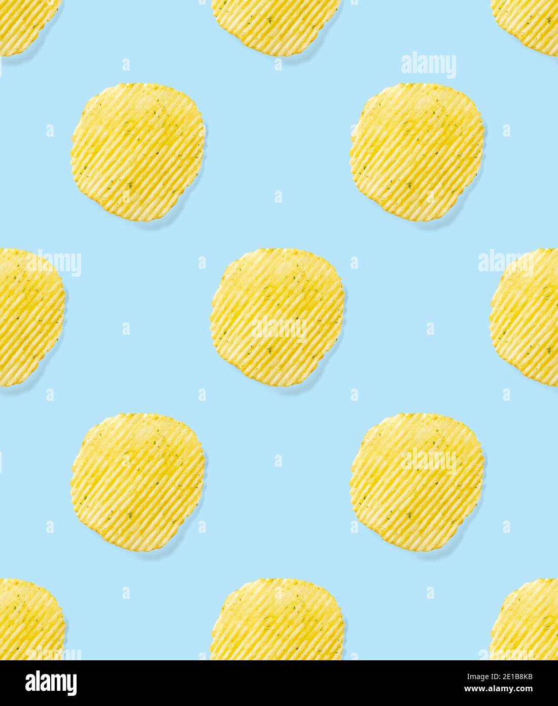 Seamless pattern made from Potato chips on light blue background flat ...