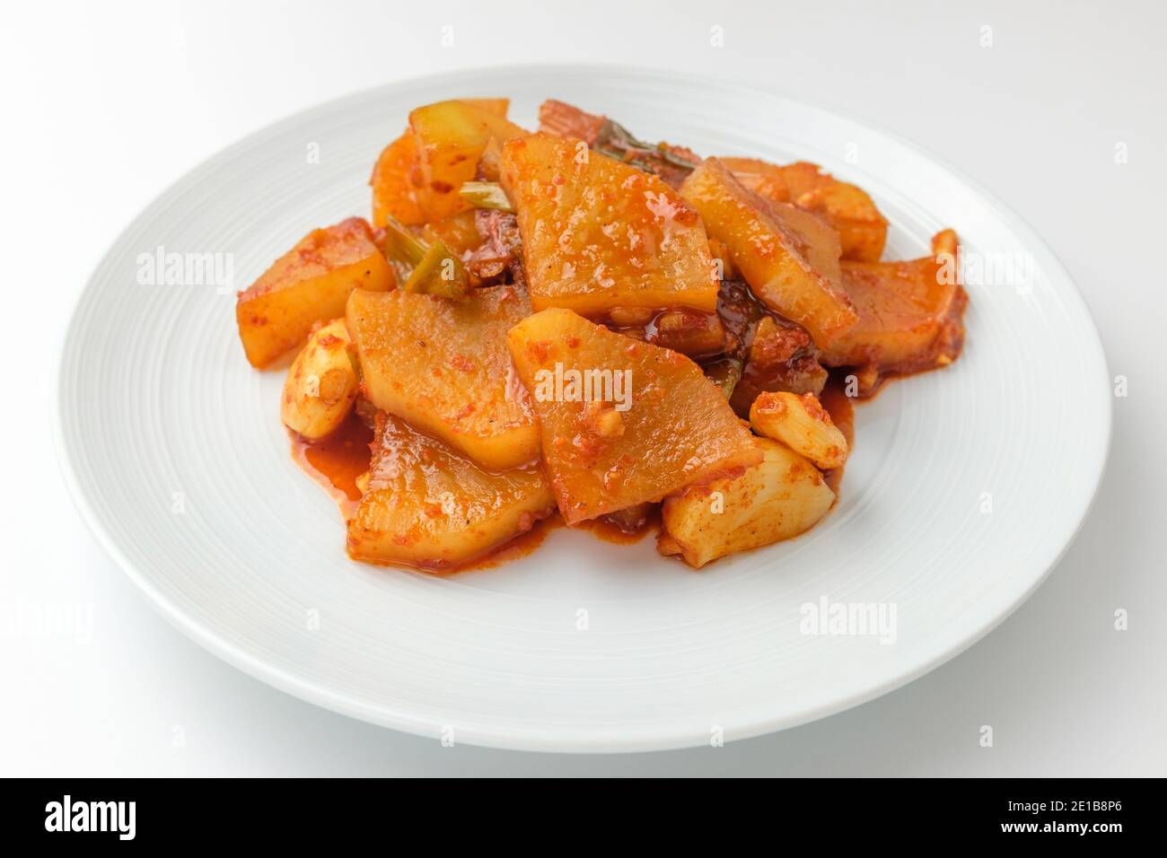 Boiled radish on a white background Stock Photo - Alamy