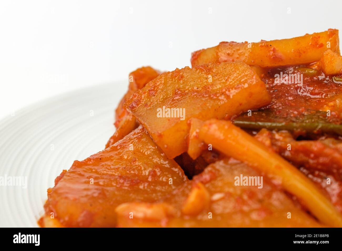 Boiled radish on a white background Stock Photo - Alamy
