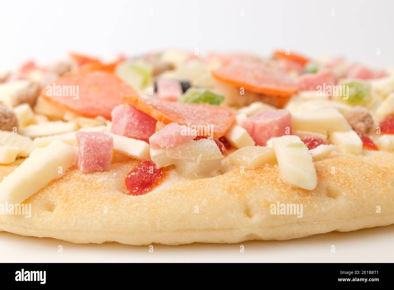 Frozen pizza on white background Stock Photo - Alamy