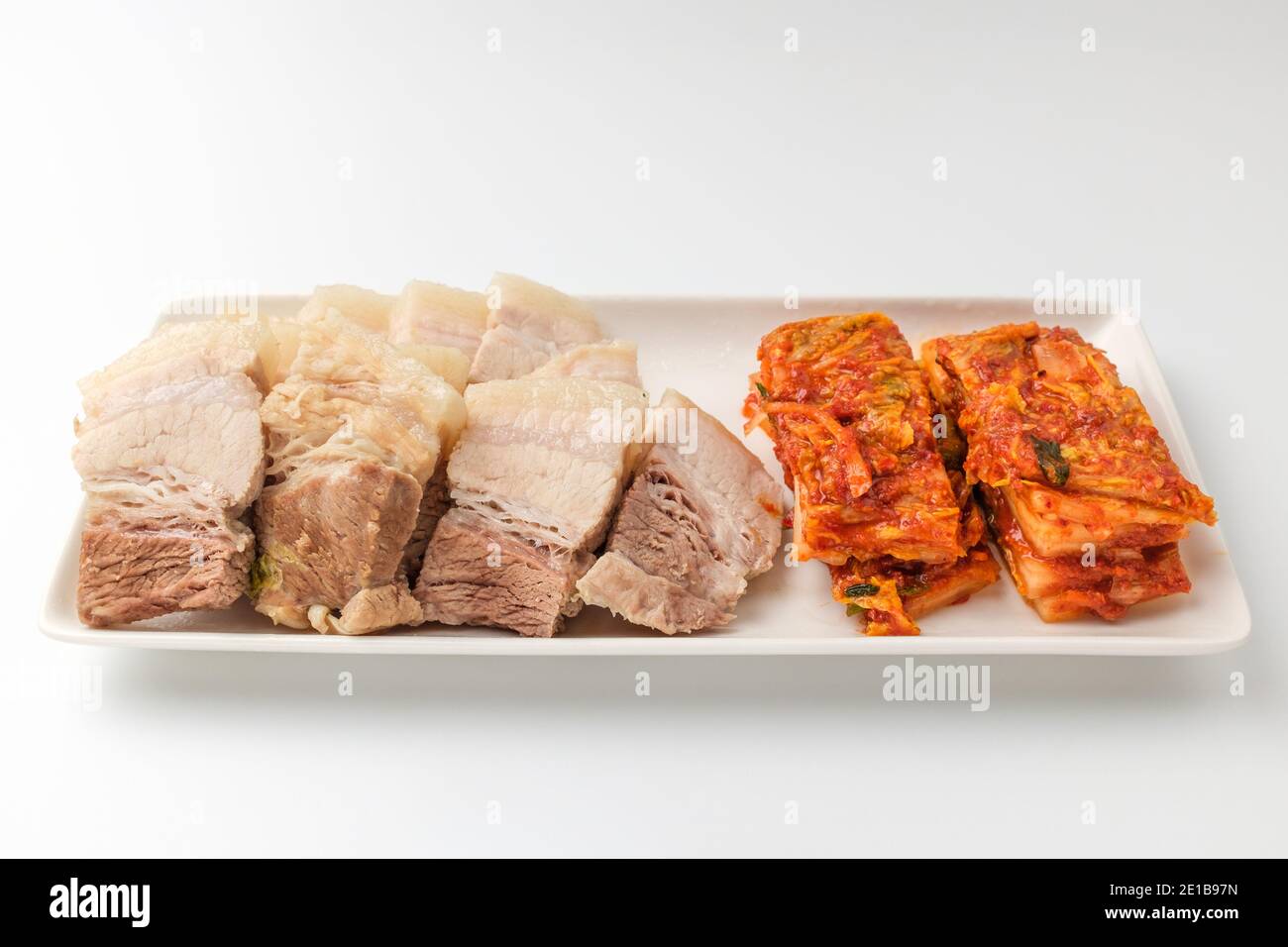 Boiled pork on white background Stock Photo - Alamy