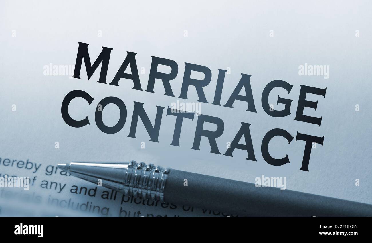 Marriage contract and luxury pen. Pre marital prenuptial agreement ...