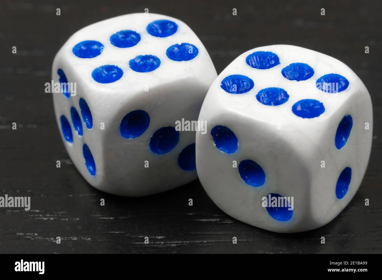 Close up two rolling dice hi-res stock photography and images - Alamy