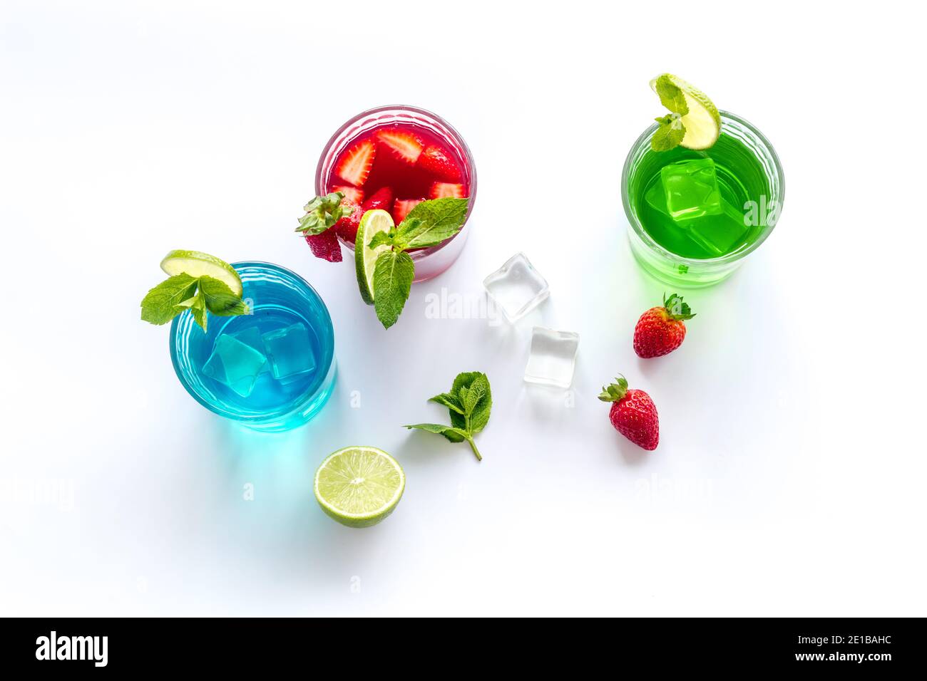 Set of different drinks cocktails with ice - red blue and green. Top ...