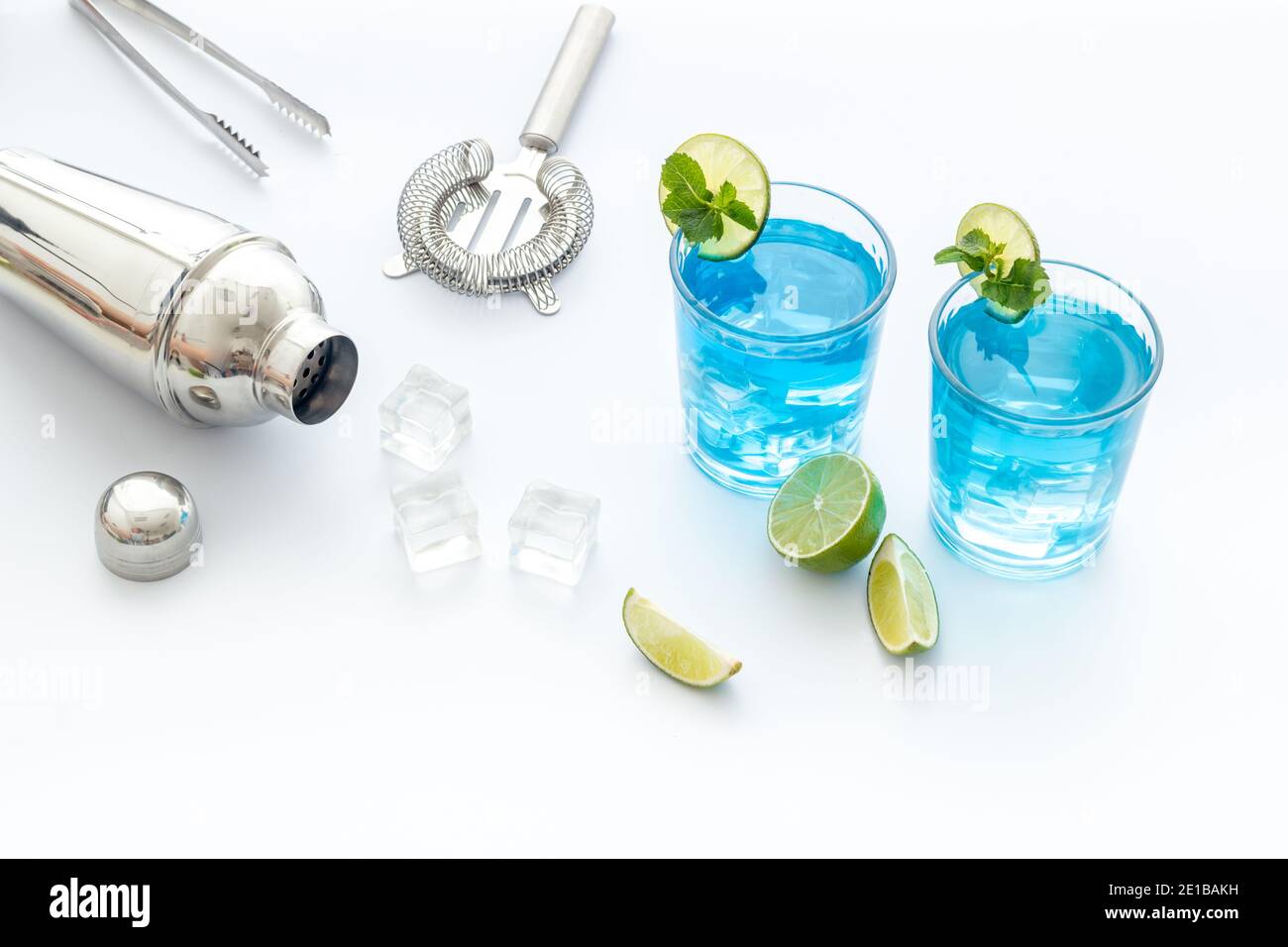 Blue cocktail drinks with bar tools and ice, close up Stock Photo - Alamy