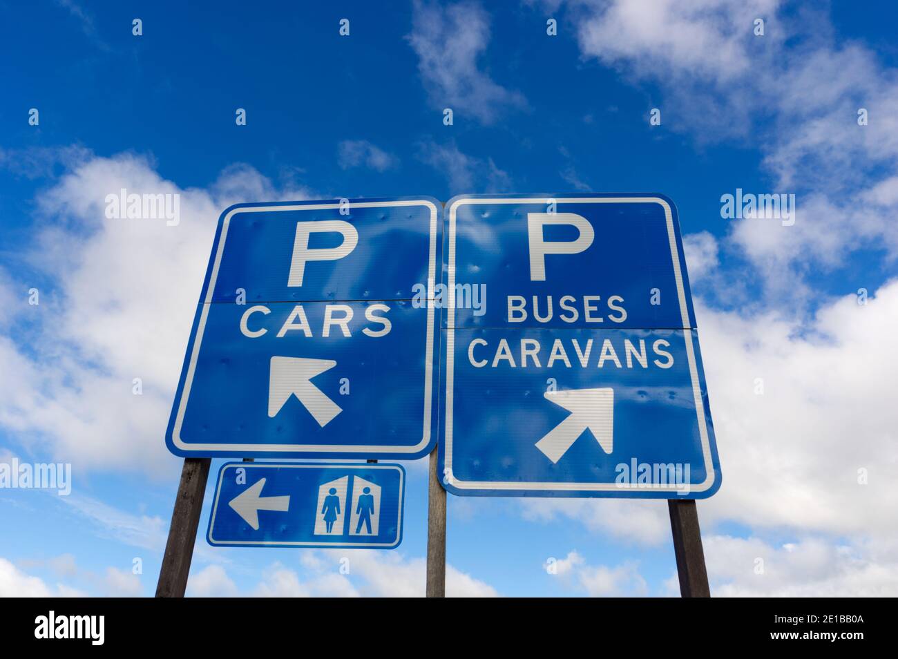 Australian direction sign showing cars, buses and caravans parking ...