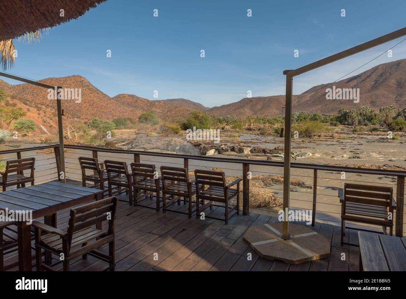 Wooden terrace with a view of the Kunene River, Namibia Stock Photo - Alamy