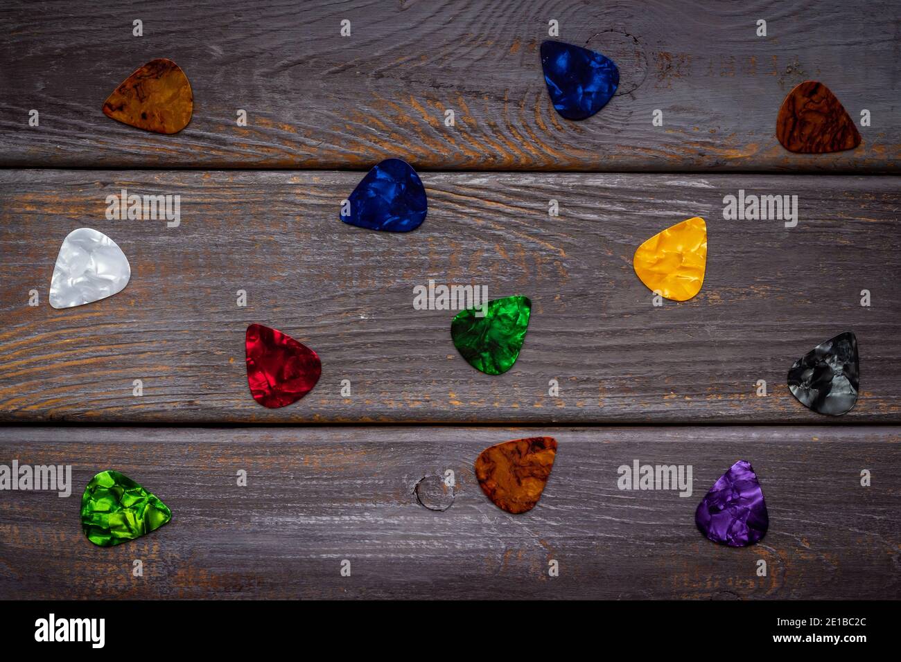 Guitar picks pattern. top view. Music background Stock Photo - Alamy