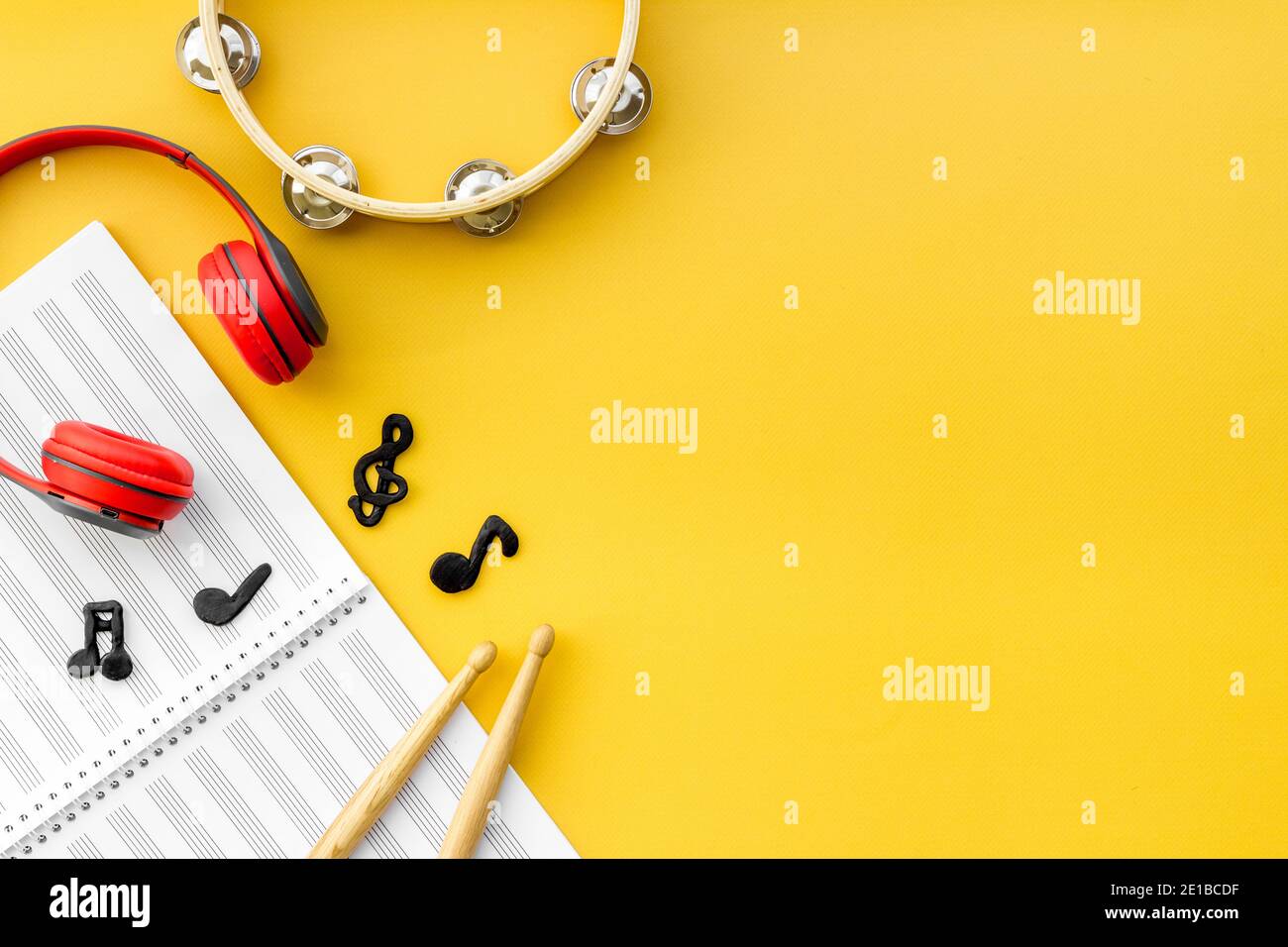 Flat lay of music background - instrument with sheet music, top view ...