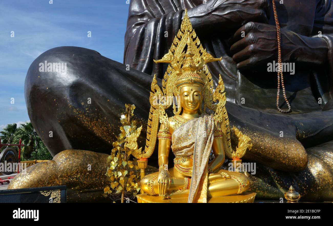 The attitude of subduing Mara of golden Seated Buddha Statue, Sculpture ...