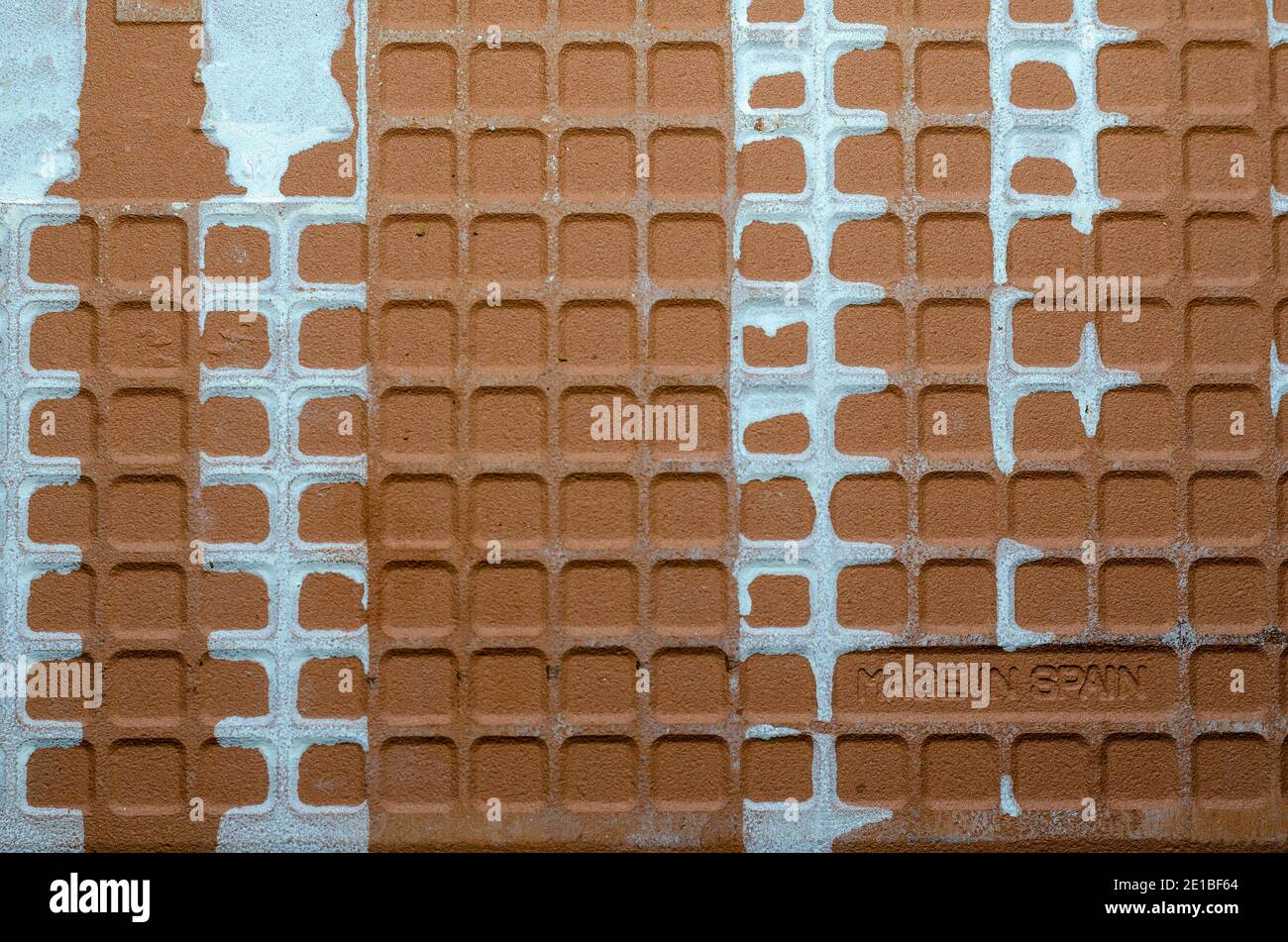 Construction and finishing materials concept. Backside of ceramic tile ...