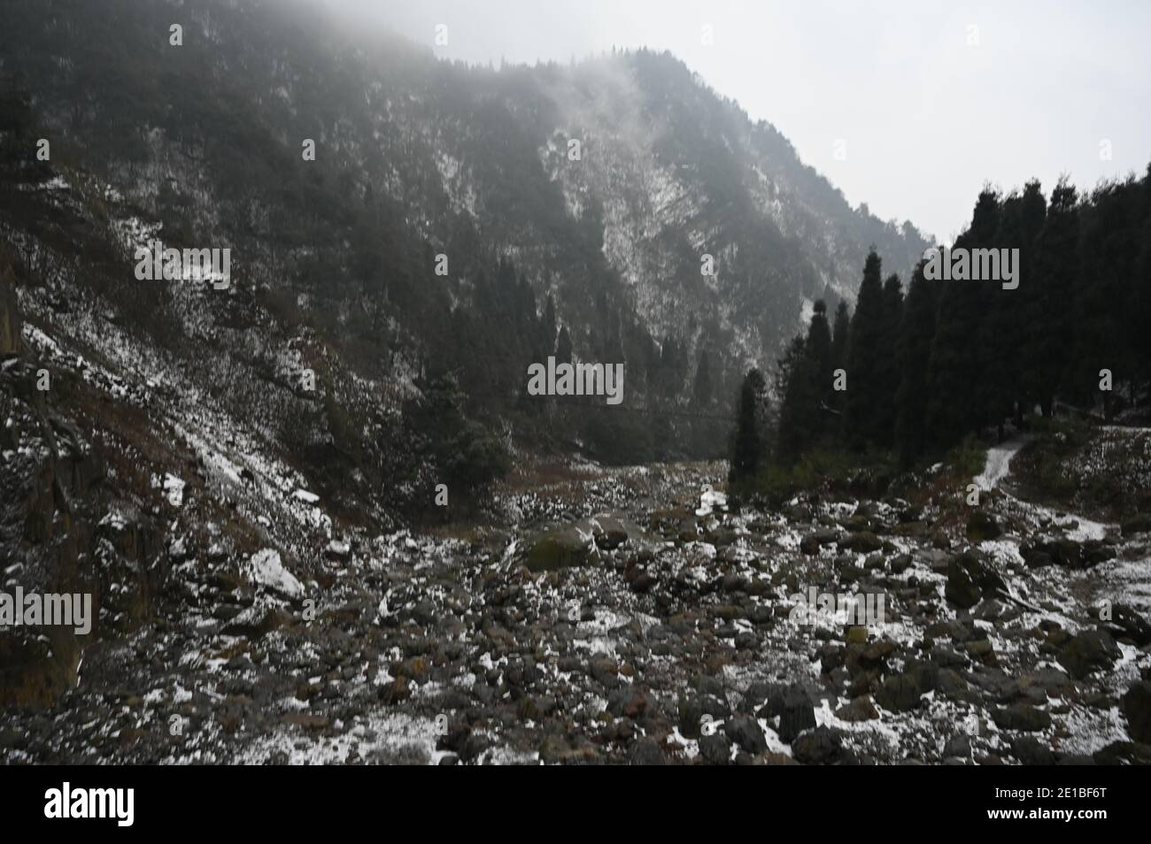 The view of tourist walking in the Jiufeng mountain, where abandoned ...