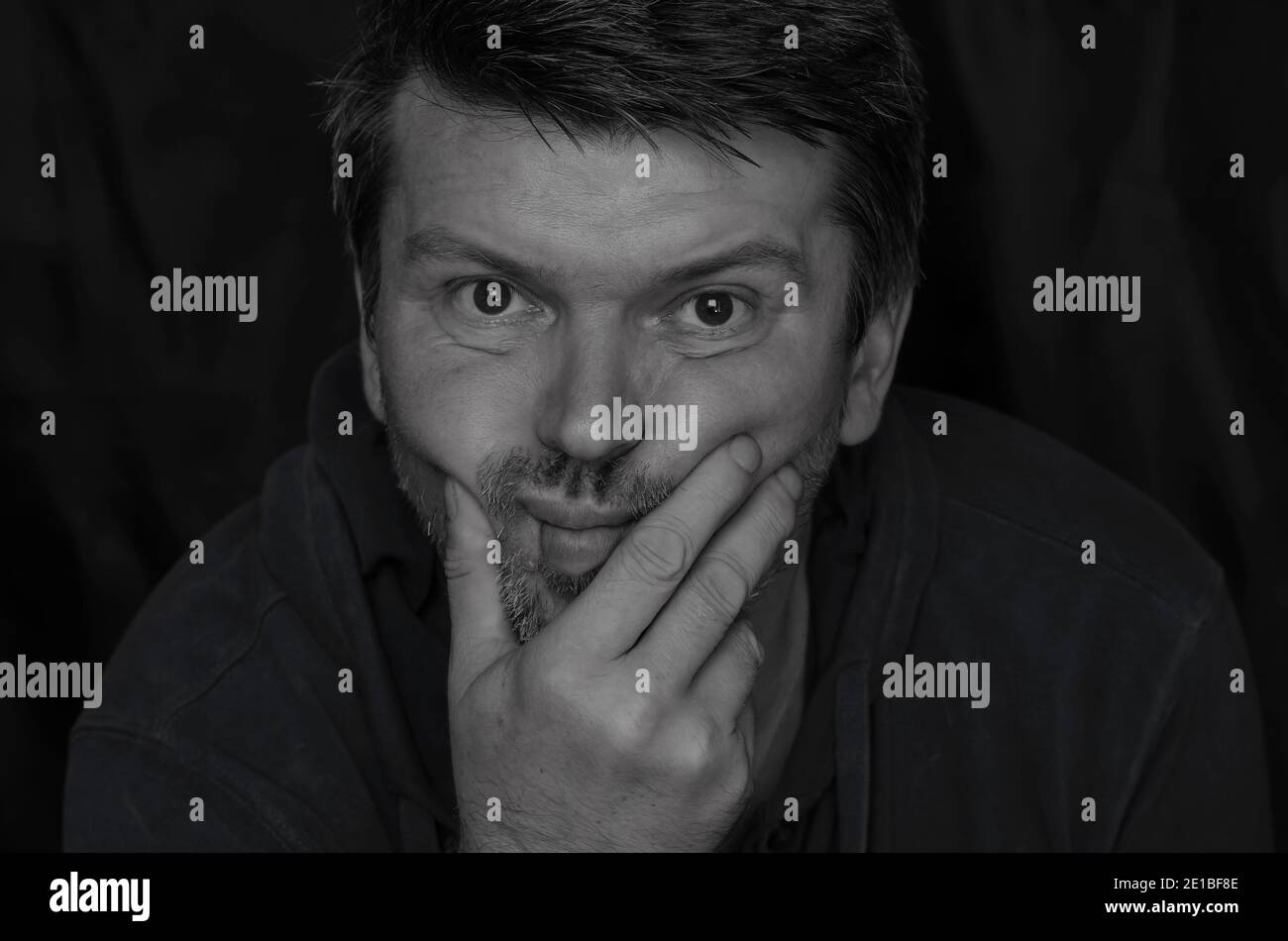 Body language concept. Black and white portrait of an adult man ...