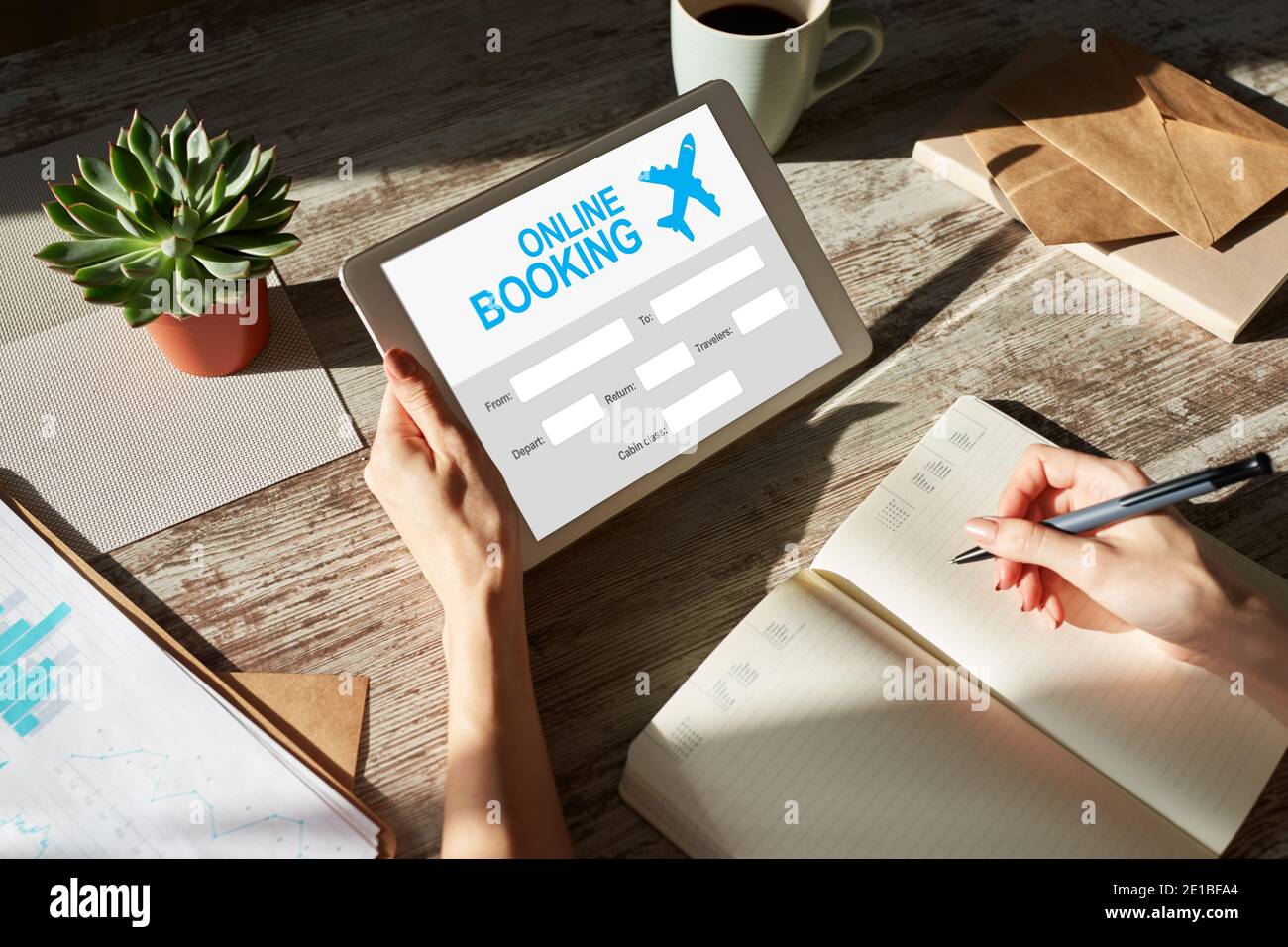 Online flight booking service form on device screen Stock Photo - Alamy