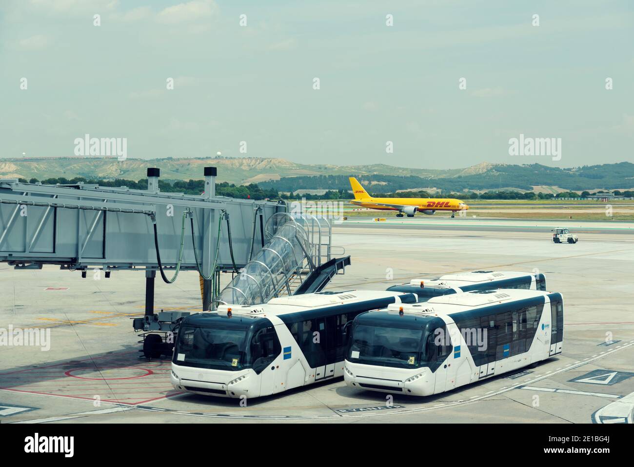 2018, 9 May, Sofia, Bulgaria. Two buses and one airplane on a runway in ...