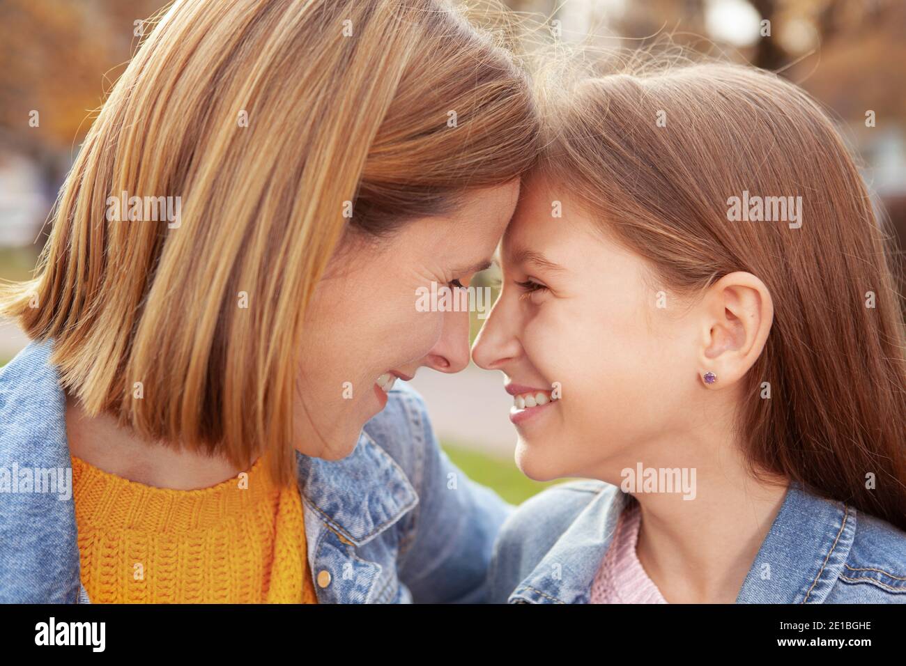 Children touching foreheads hi-res stock photography and images - Alamy