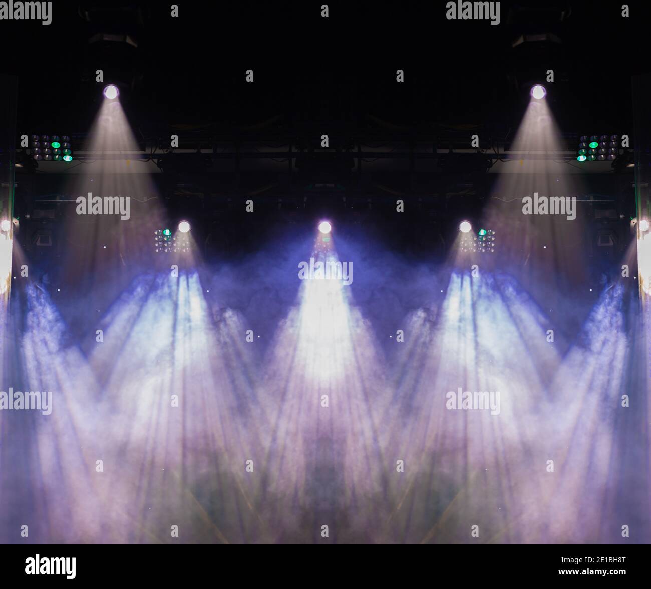 The stage of the theater illuminated by spotlights from the auditorium ...