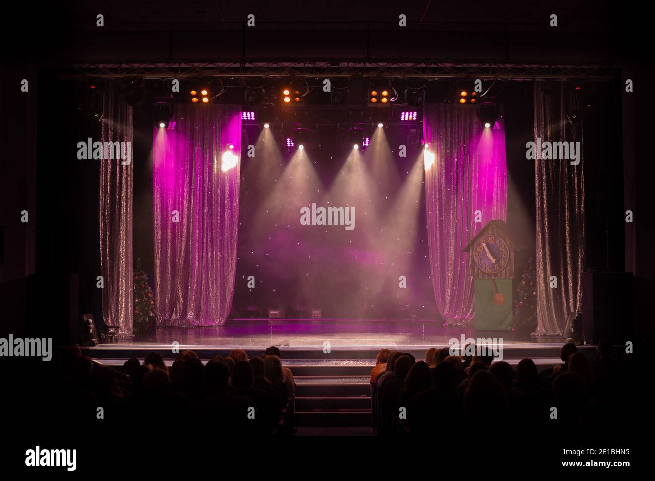 An empty stage of the scene concert hall, lit by spotlights and smoke ...