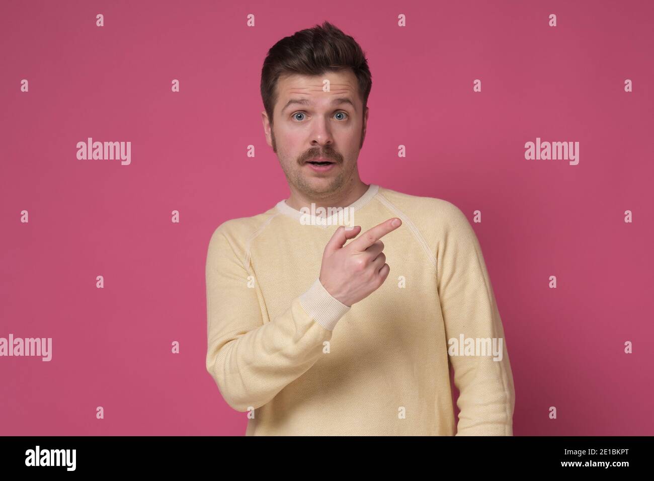 Confused pointing hi-res stock photography and images - Alamy