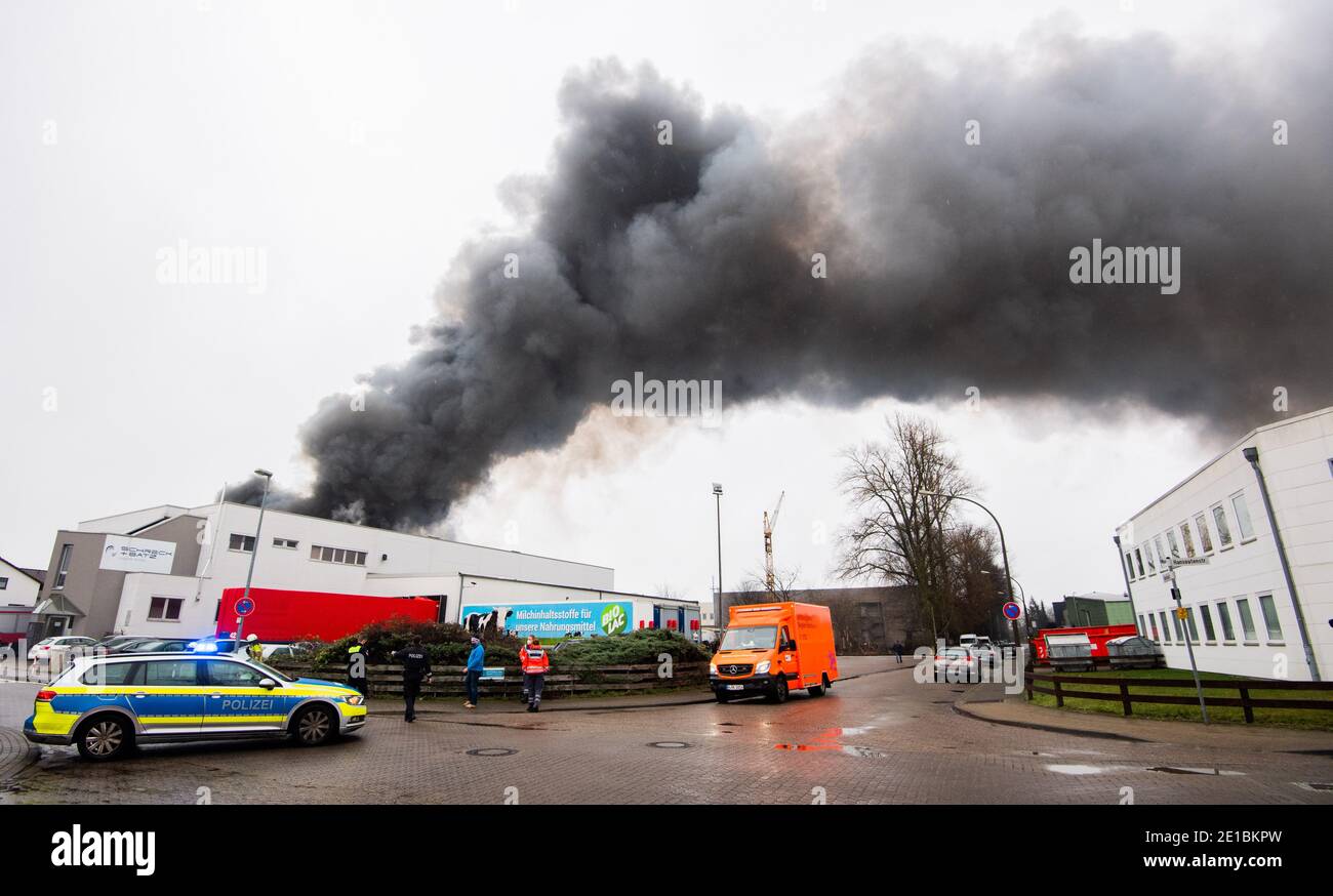 Langenhagen, Germany. 06th Jan, 2021. Dense clouds of smoke rise into ...