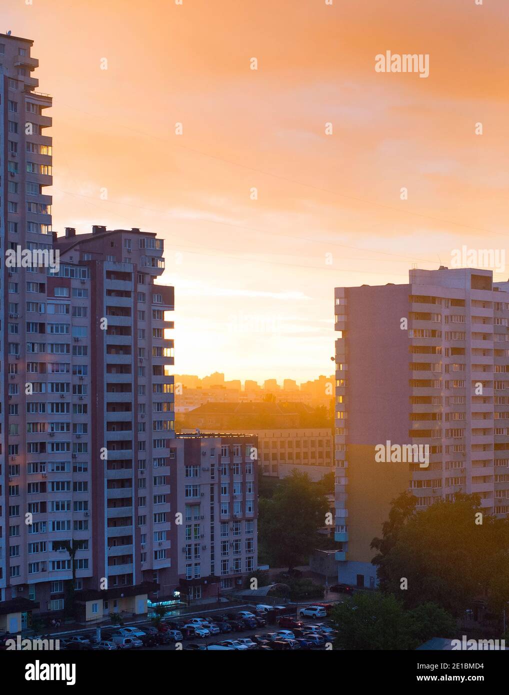 Skyline of Kyiv typical living district in the rain at sunset. Ukraine ...