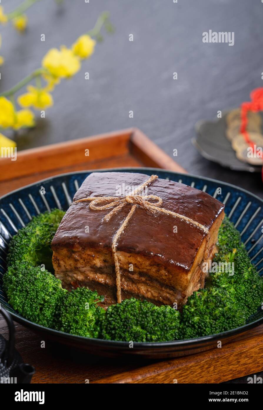Dong Po Rou (Dongpo pork meat) in a beautiful blue plate with green ...