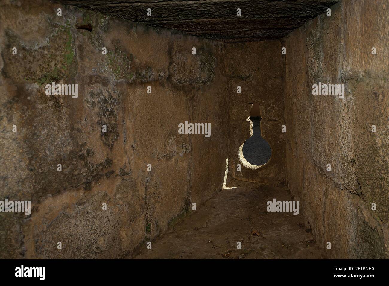 Loophole in the medieval walls of Granadilla castle. Extremadura. Spain ...