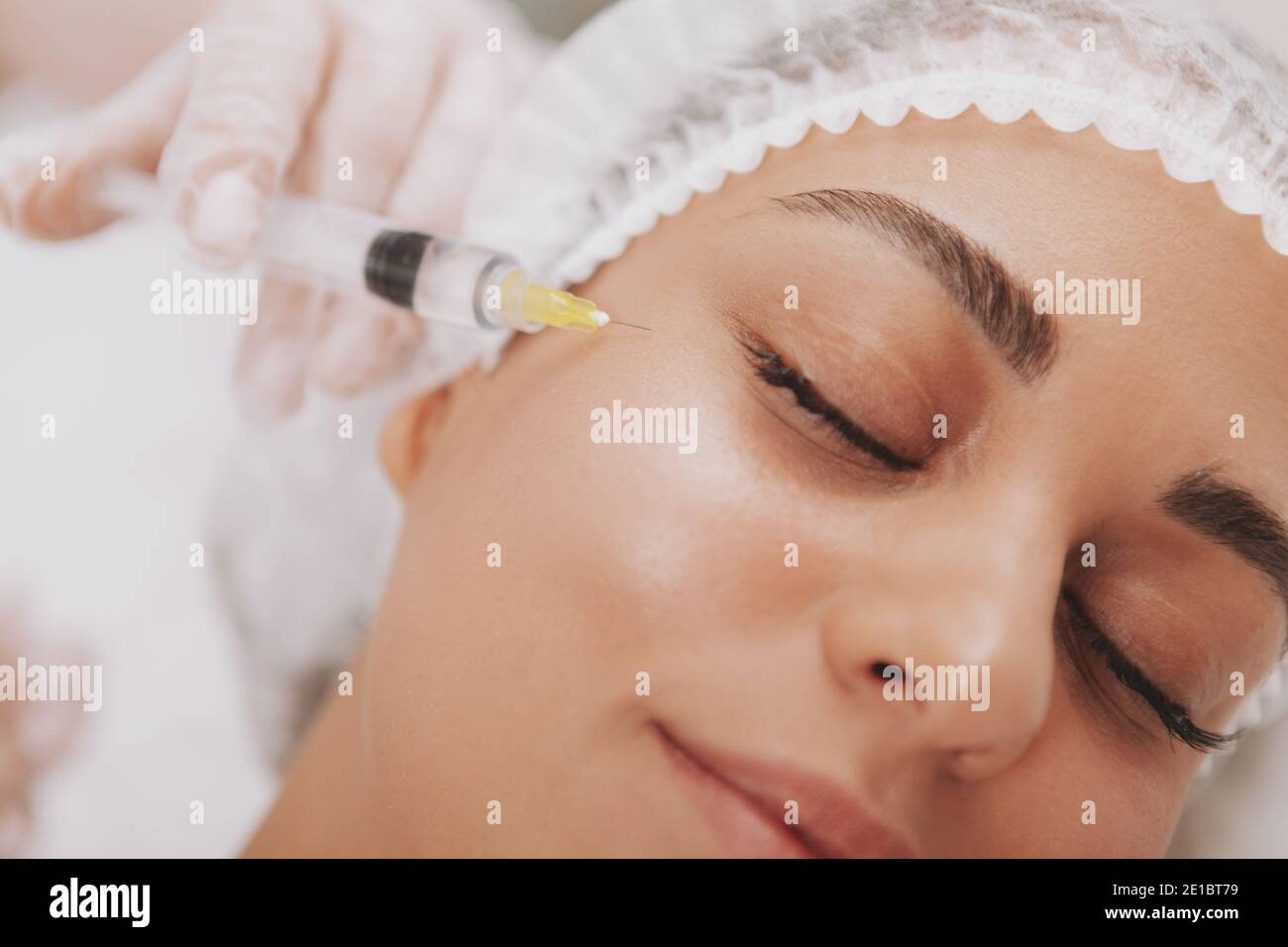 Cropped shot of a beautiful woman getting rejuvenating facial ...