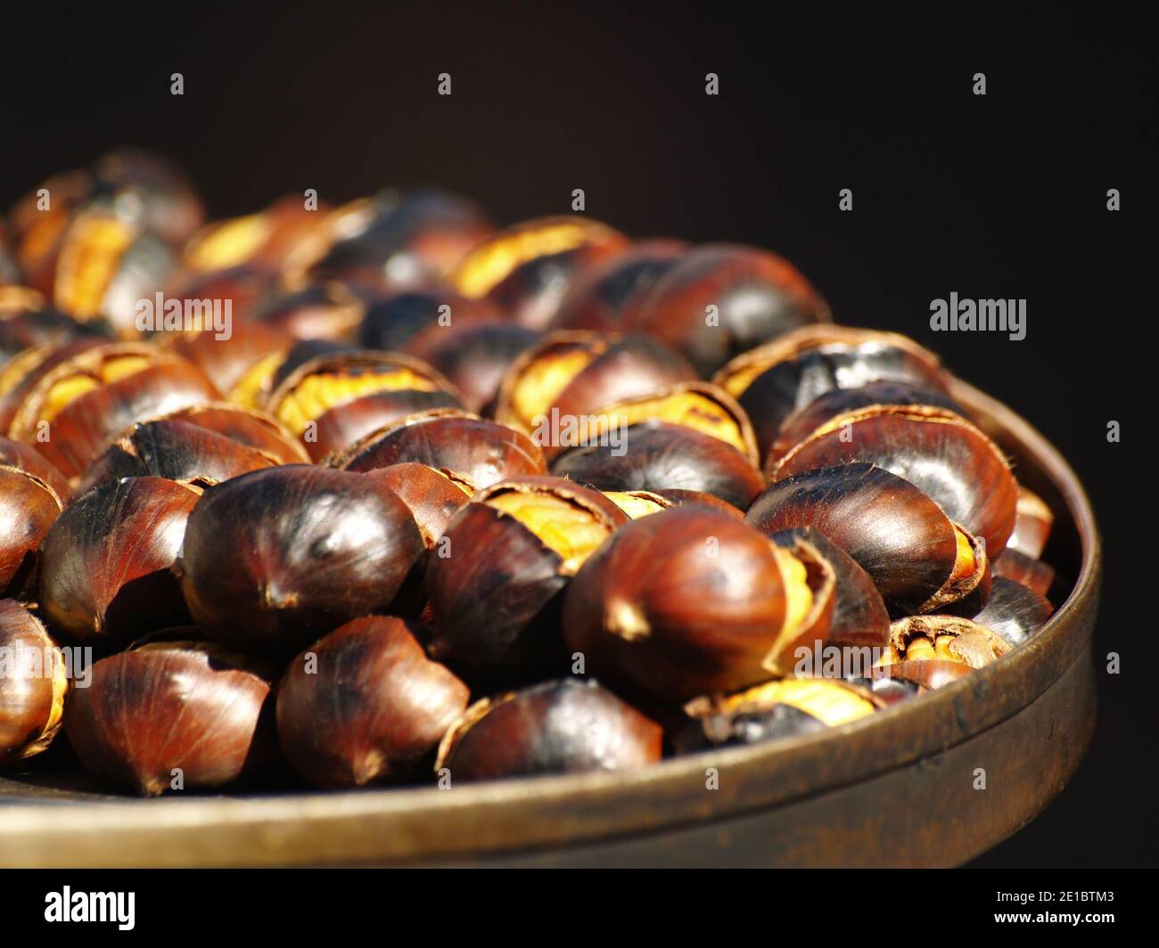 Roasted hot chestnuts Stock Photo - Alamy