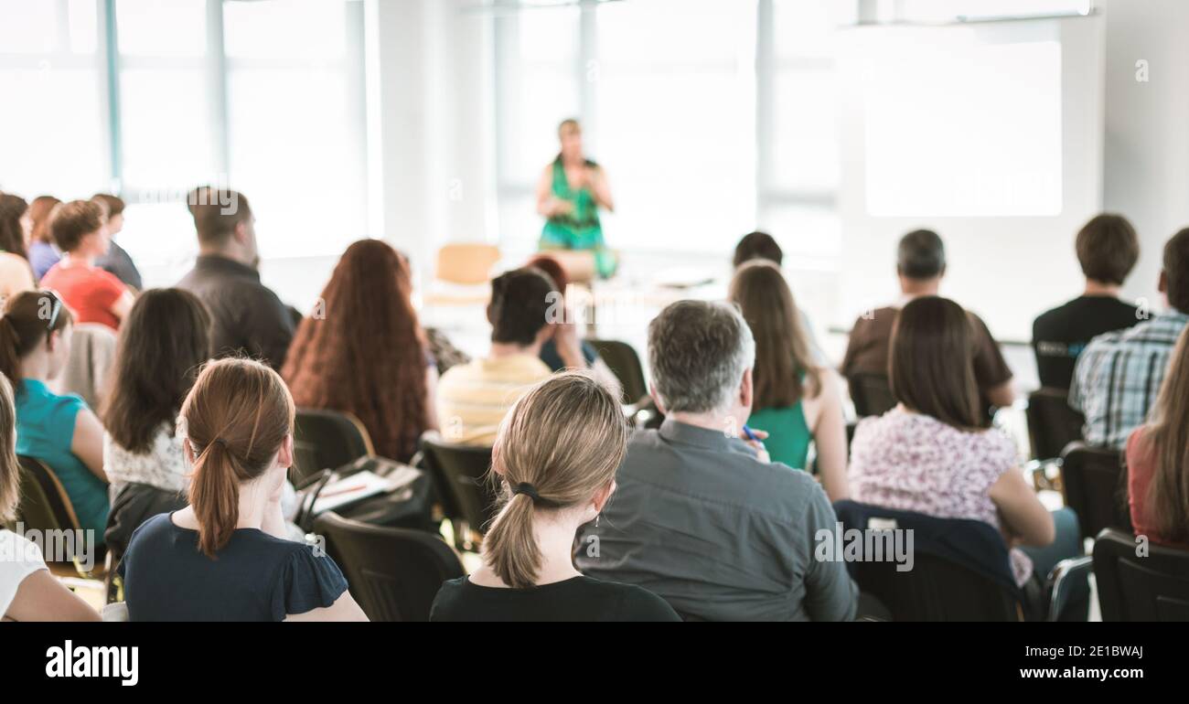 Speaker giving a talk in conference hall at business meeting event ...
