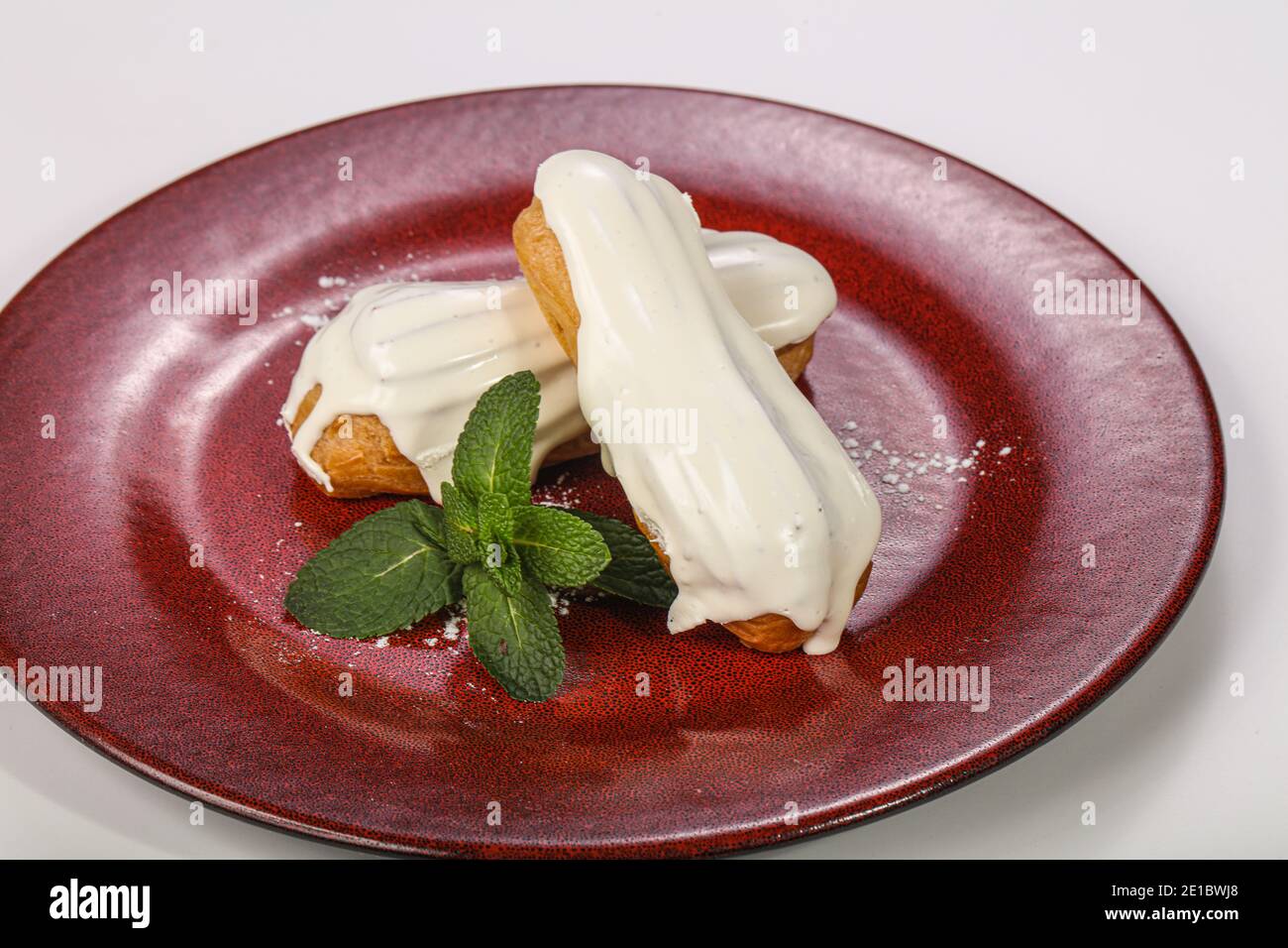 Sweet eclair dessert for gourmet served mint Stock Photo - Alamy