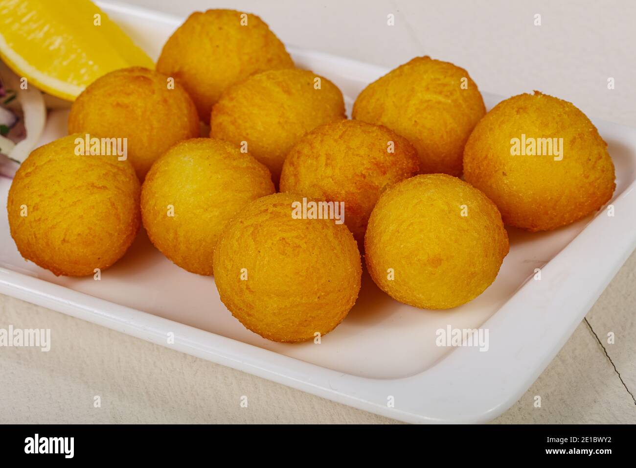Tasty hot crispy fried potato balls Stock Photo - Alamy