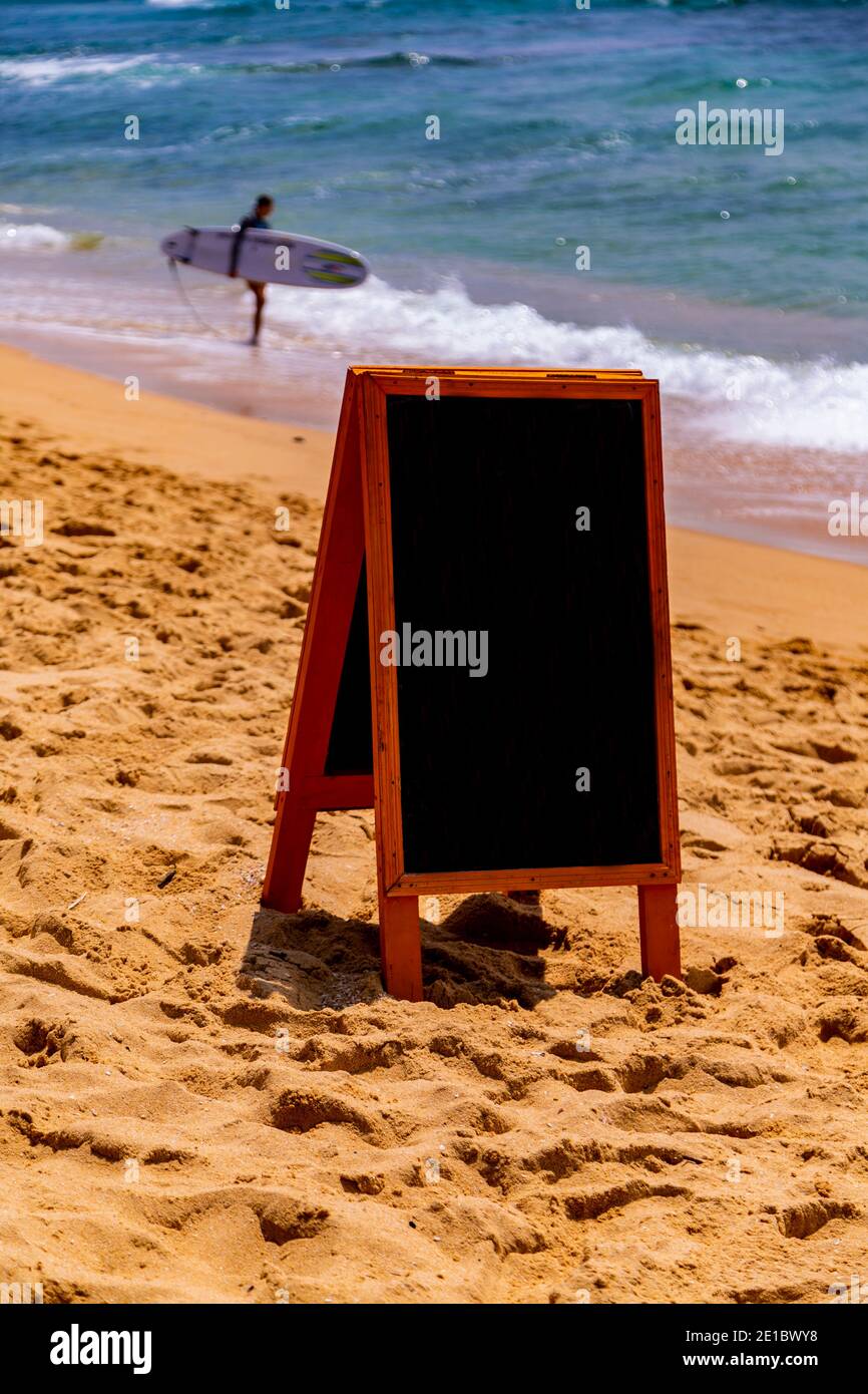 Chalk board for text, message or advertising on the sunny ocean sandy ...