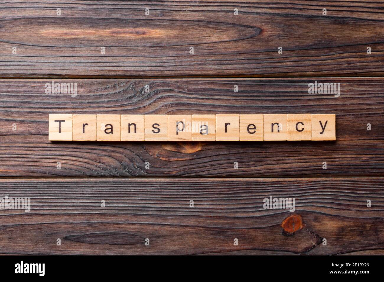 transparency word written on wood block. transparency text on table ...